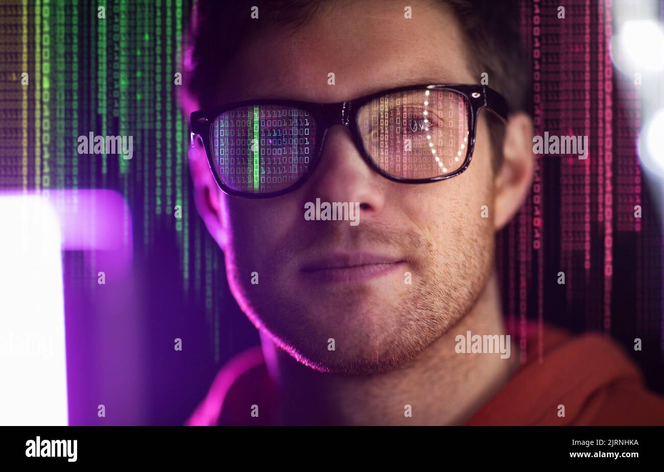 man in glasses over neon lights and binary code Stock Photo - Alamy