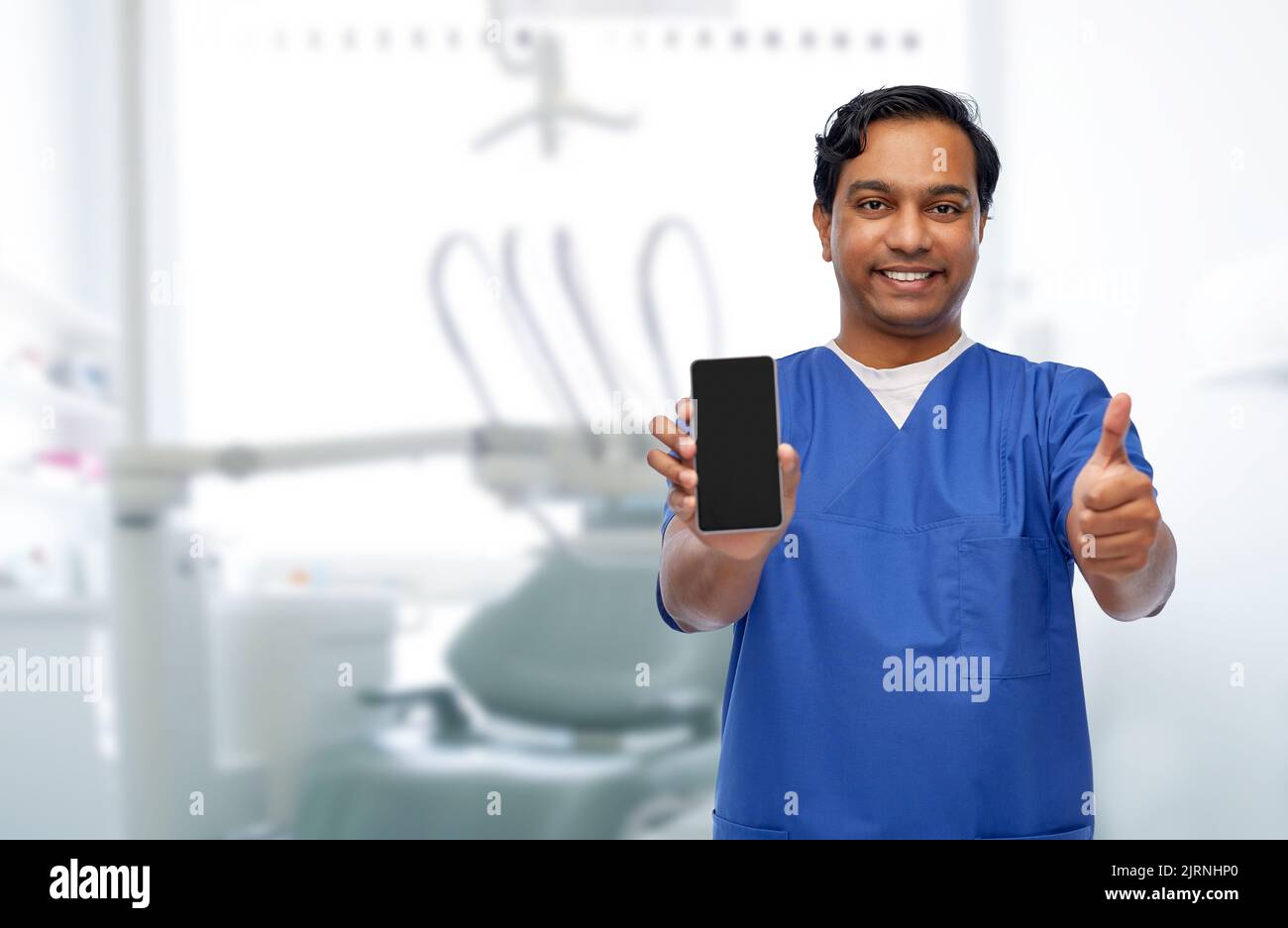 South indian man showing mobile hi-res stock photography and images - Alamy