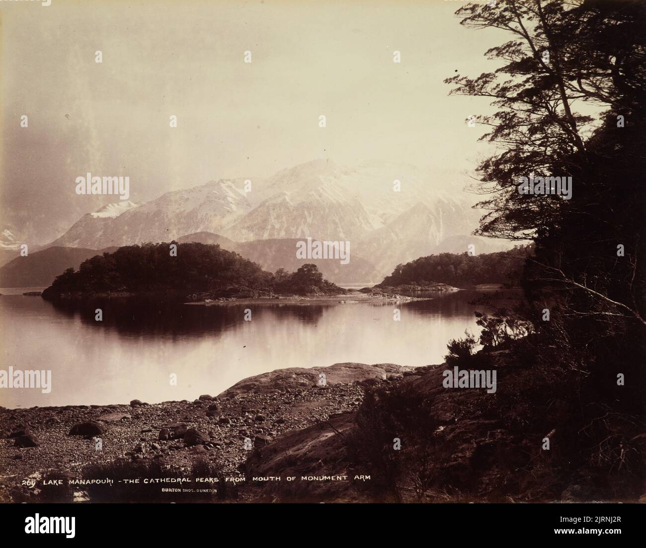 Lake Manapouri – The Cathedral Peaks from mouth of Monument Arm, circa ...