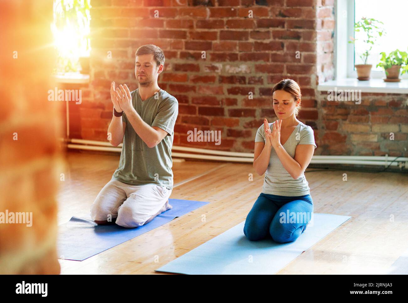 Yoga man woman hi-res stock photography and images - Alamy