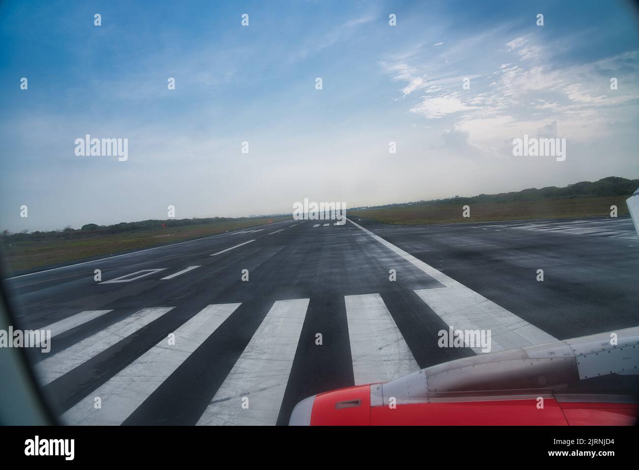 A beautiful shot of an airport flight line viewed from inside an ...