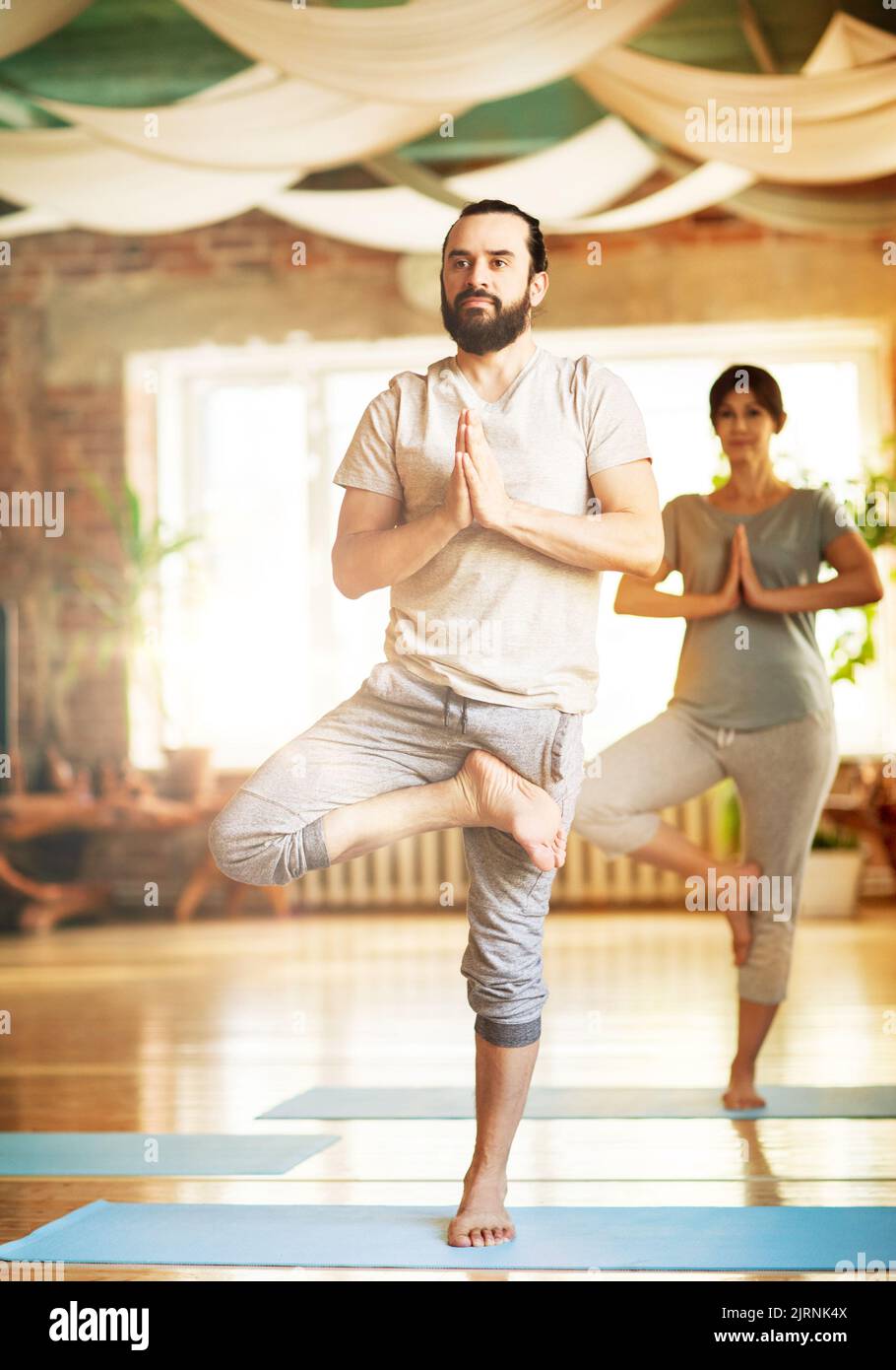Yoga tree pose man hi-res stock photography and images - Alamy