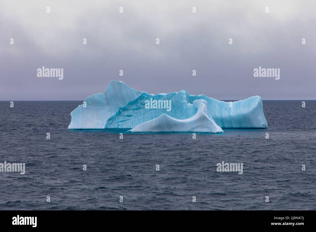 Iceberg from a melting glacier in the arctic. The icy landscape of the ...
