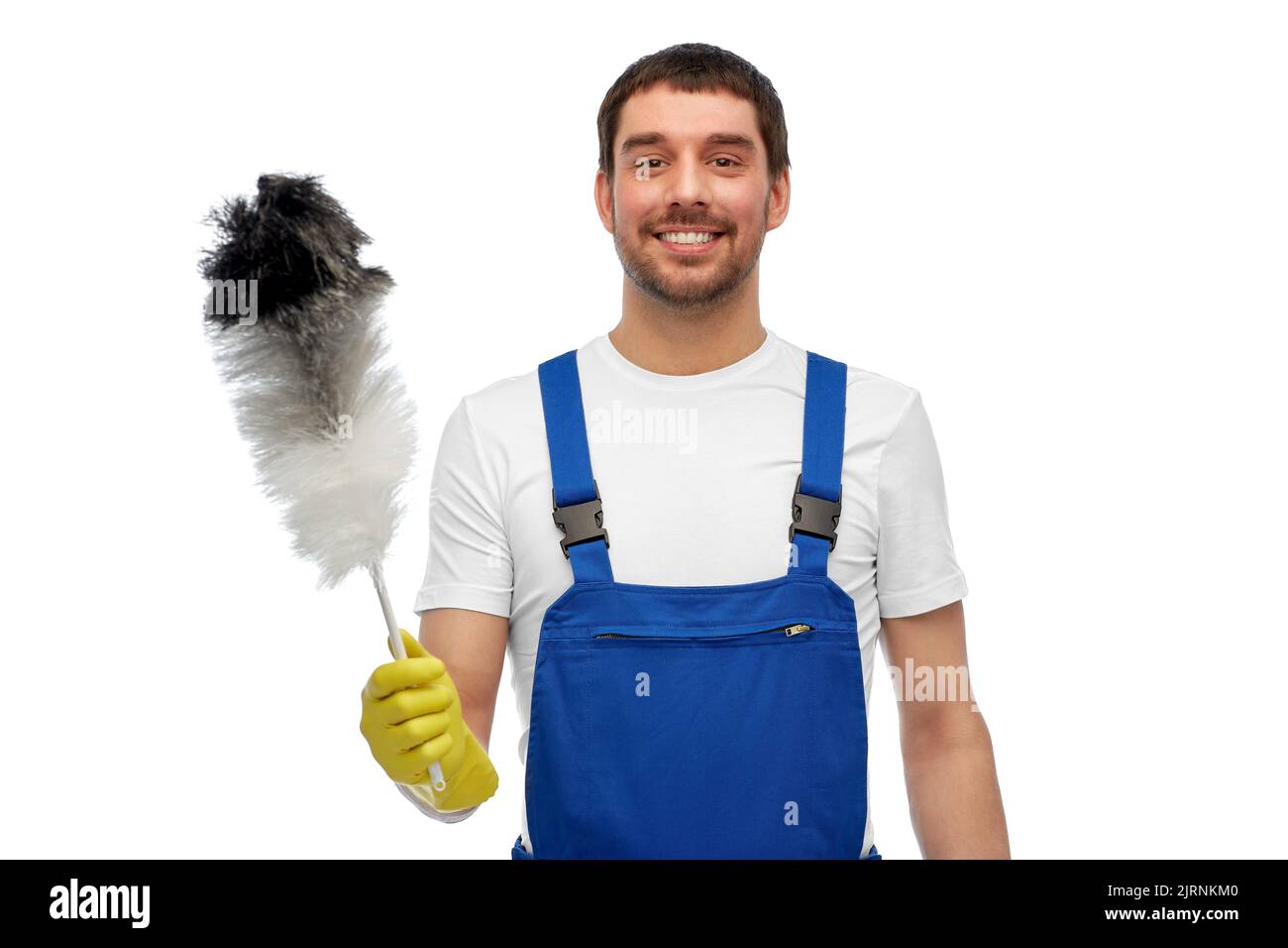 happy male worker or cleaner with duster cleaning Stock Photo - Alamy