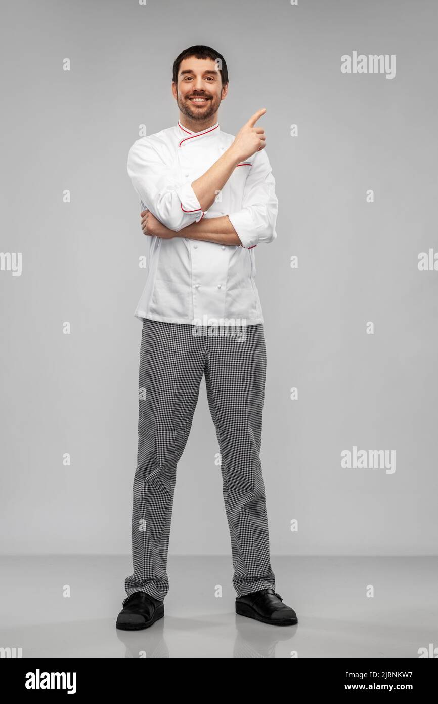 Happy chef showing something hi-res stock photography and images - Alamy