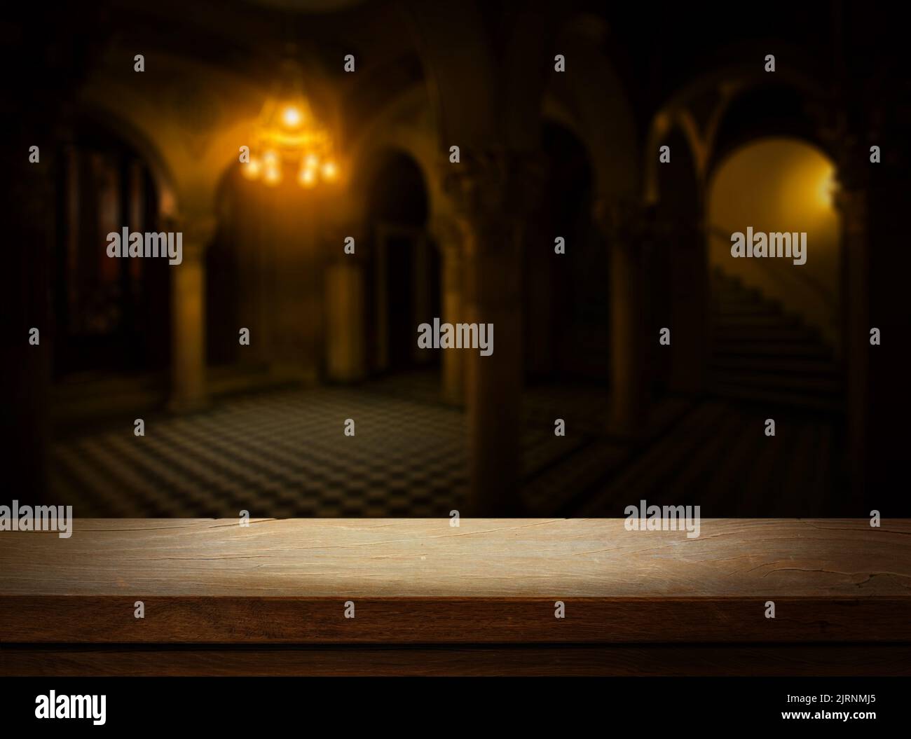 Empty wooden table on mystical dungeon of an ancient gothic castle ...