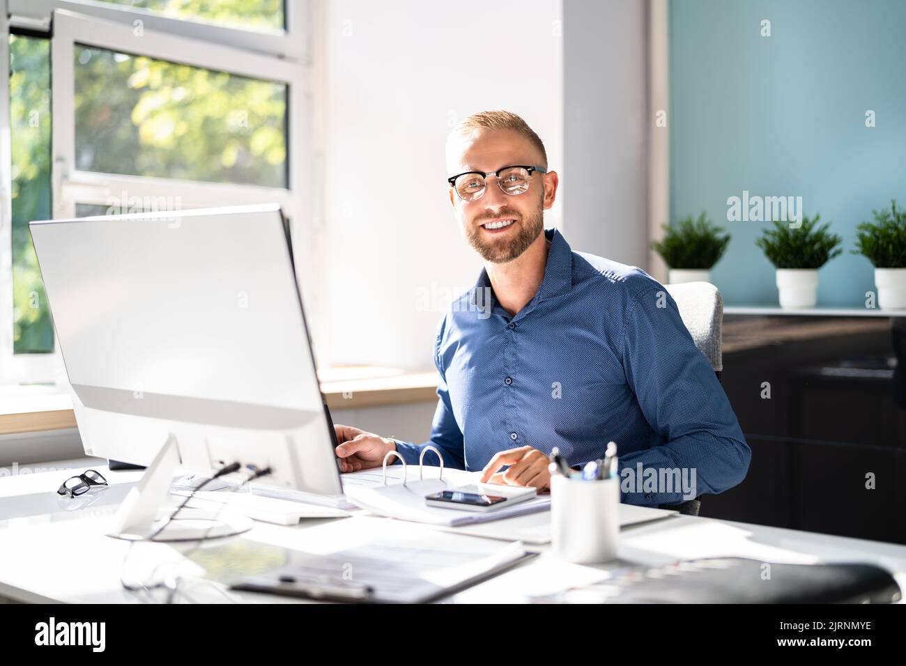 Male clerk hi-res stock photography and images - Alamy