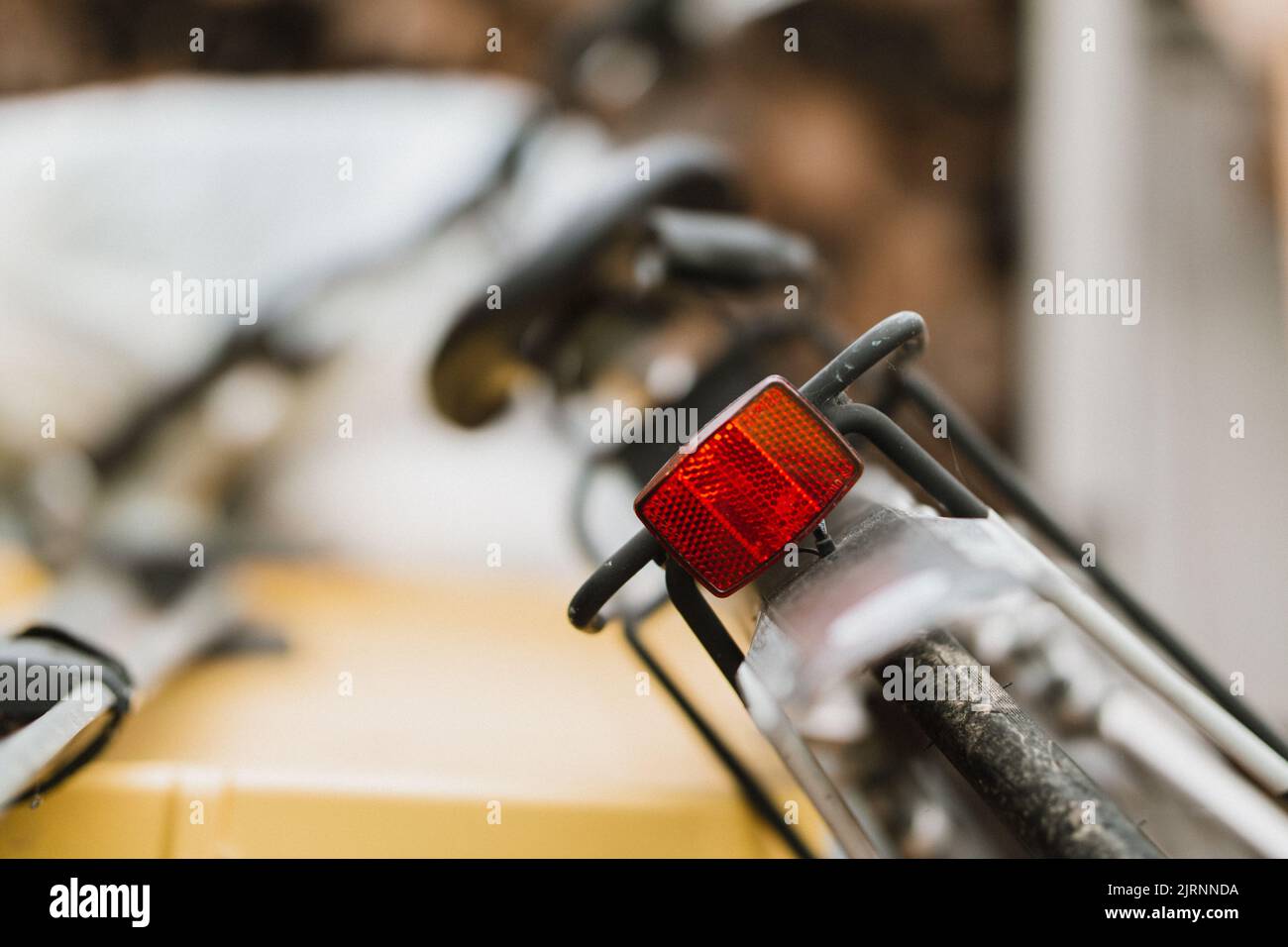 A closeup of a bicycle rear reflector Stock Photo - Alamy