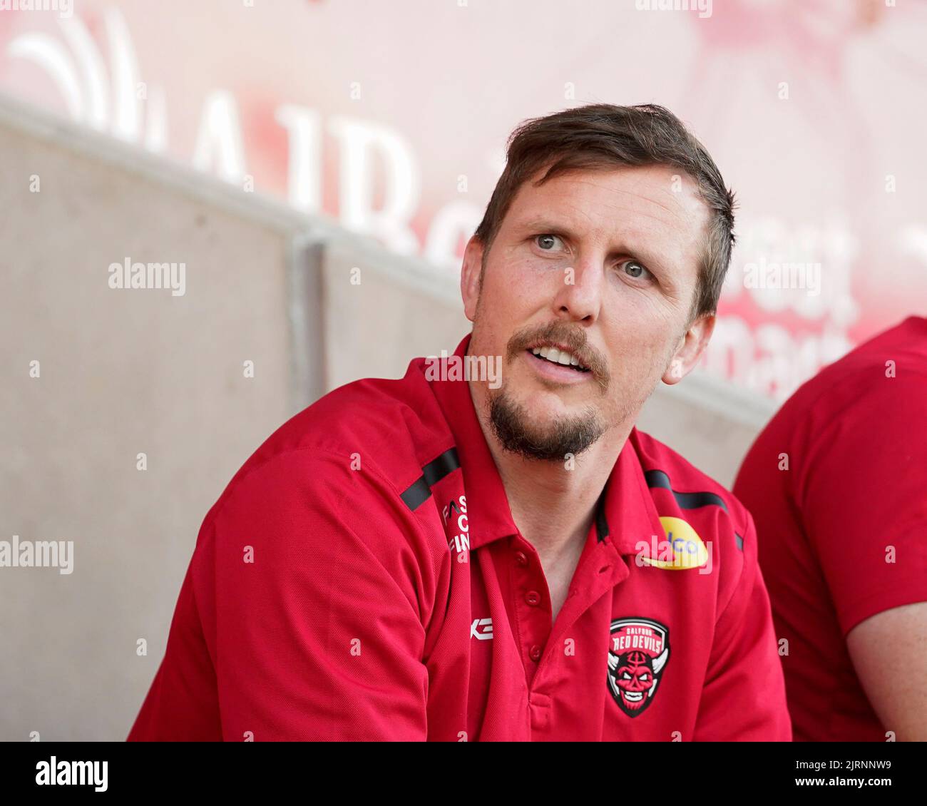 Dan Sarginson #23 of Salford Red Devils watches the ladies match after ...