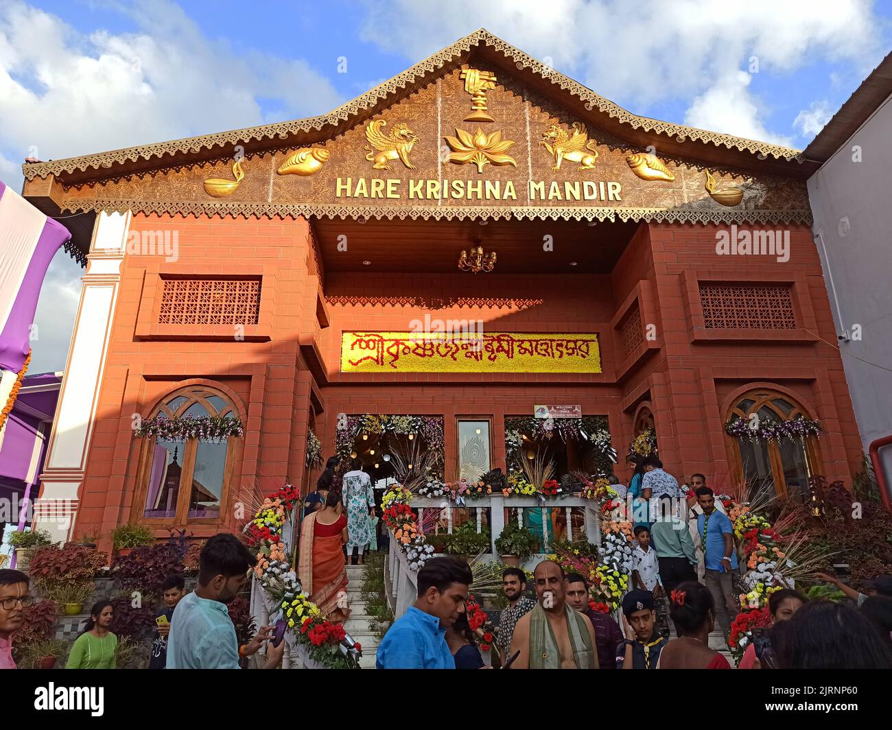 People gathered at Hare Krishna Mandir during Krishna Janmashtami, an ...