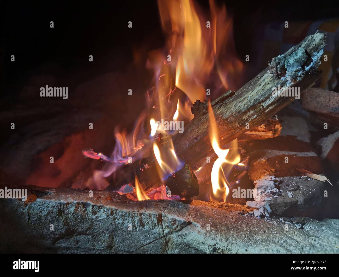 beautiful big bonfire among the rocks at night. High quality photo ...