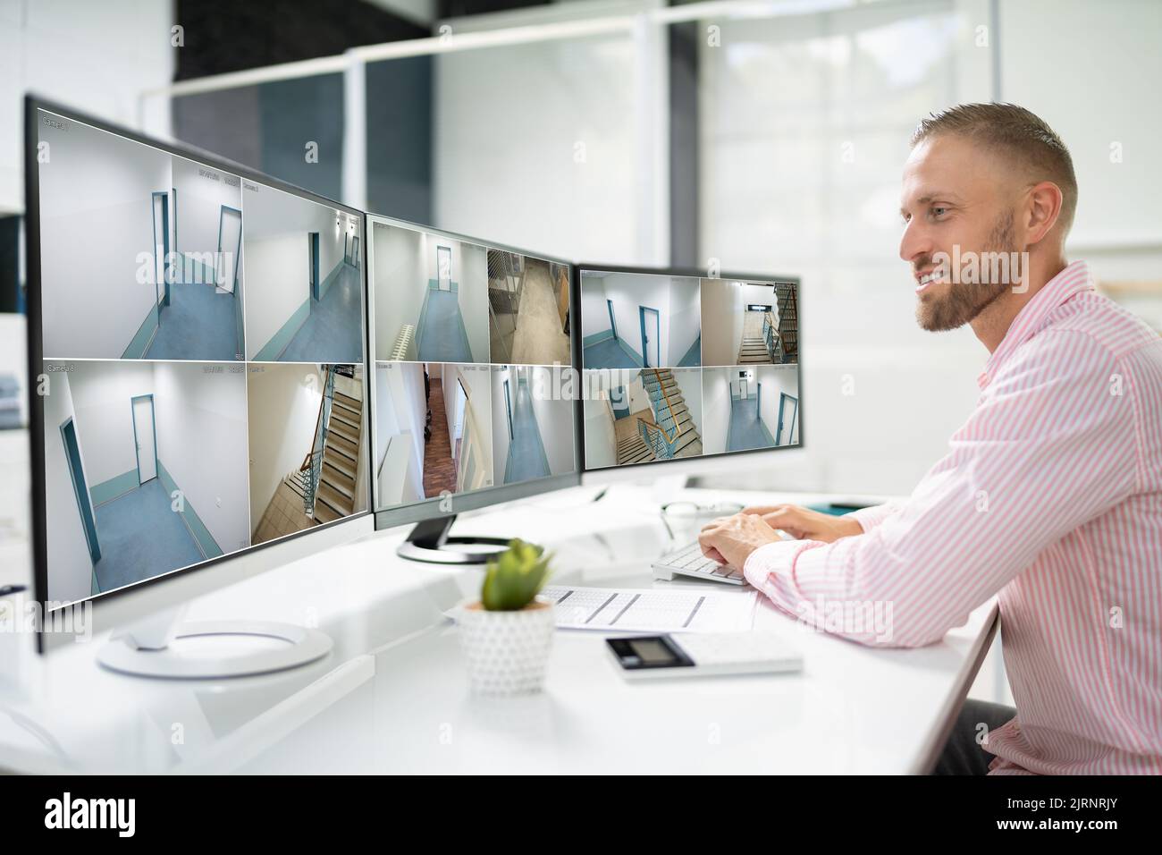CCTV Security Footage On Multiple Computer Monitors Stock Photo - Alamy