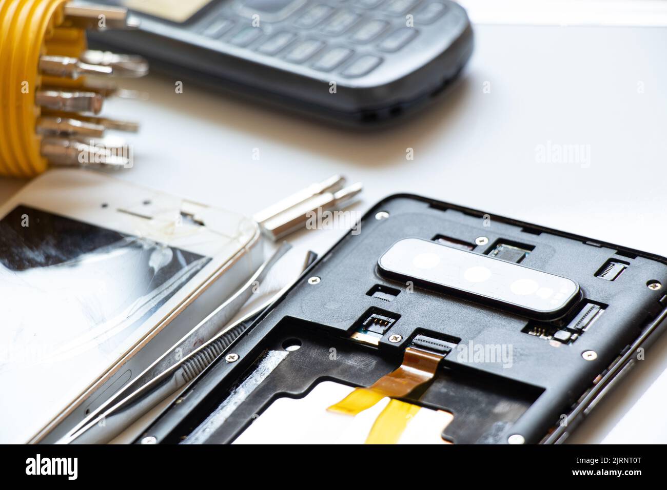 Disassembled mobile phone, phone repair and maintenance, service Stock ...