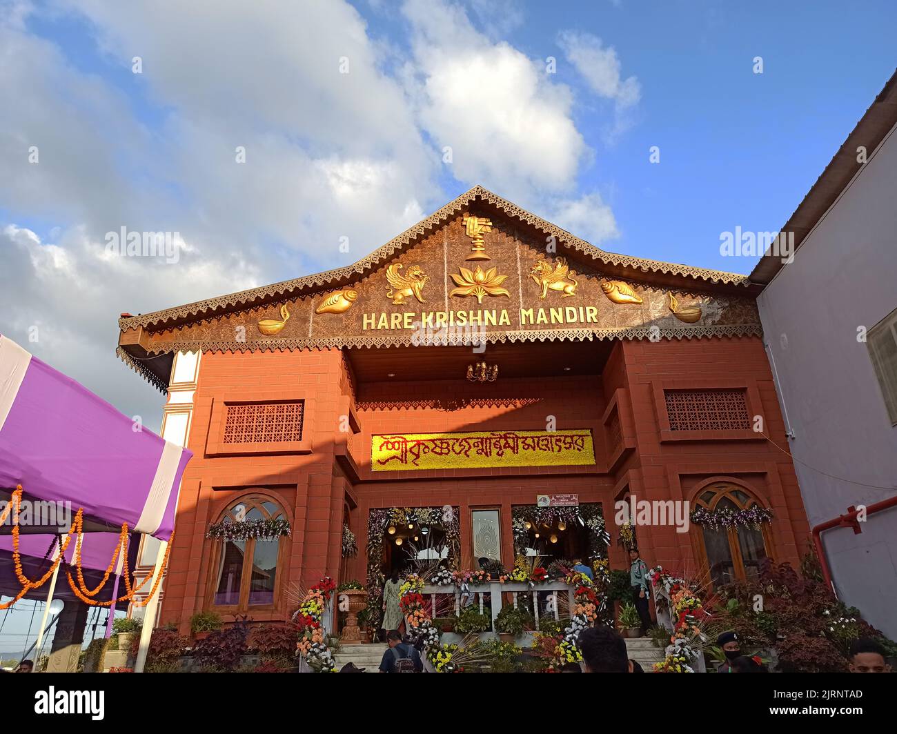 People gathered at Hare Krishna Mandir during Krishna Janmashtami, an ...