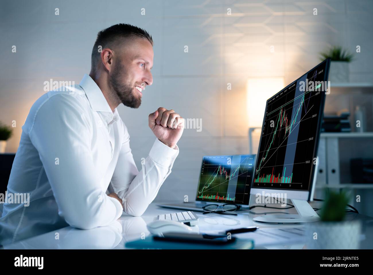 Successful male broker using hi-res stock photography and images - Alamy
