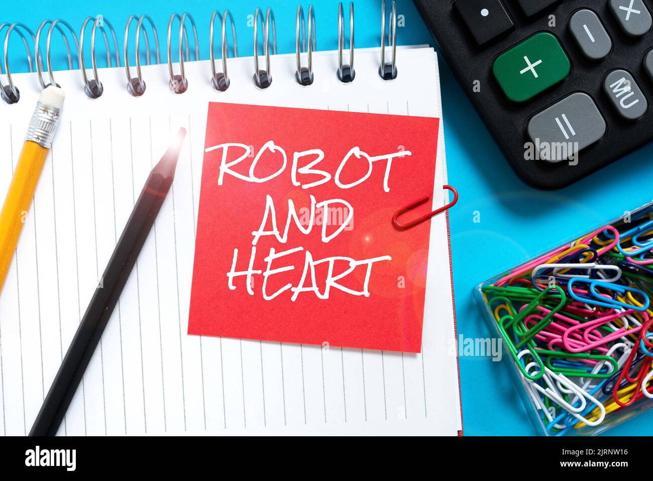Conceptual caption Robot And Heart. Word for Sensitivity and care behind the machine technology ...