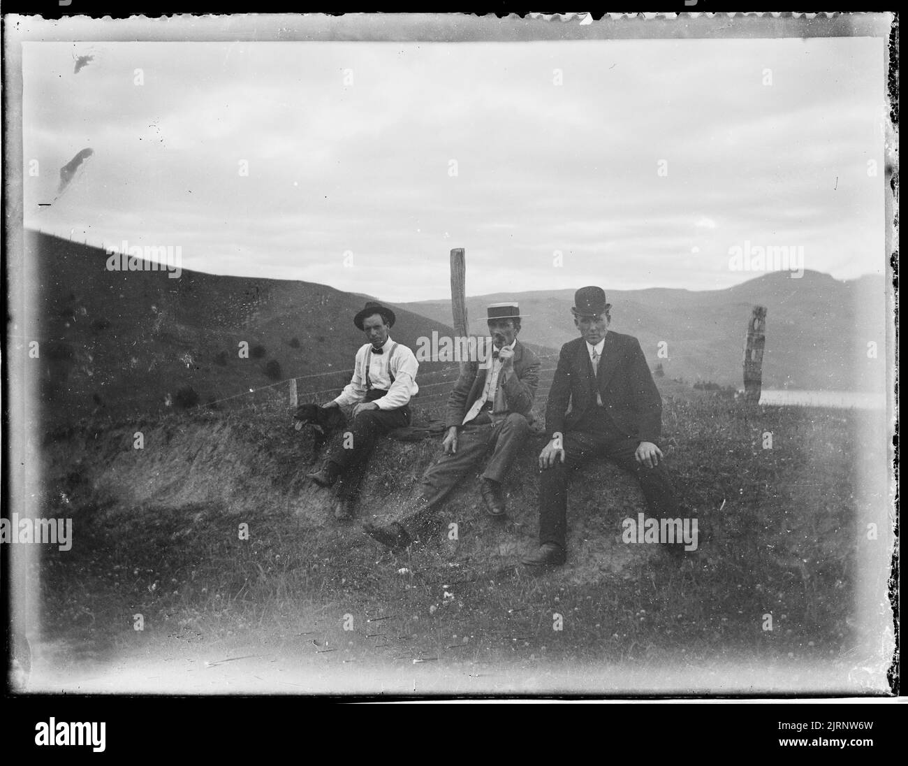 3 men, with hill landscape behind them, by Crombie and Permin Stock ...