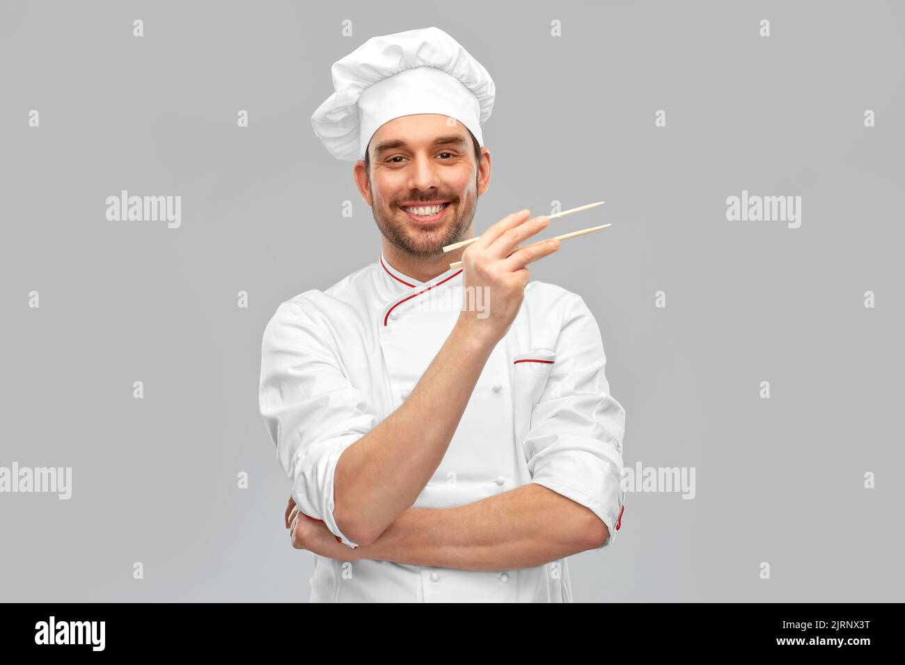 happy smiling male chef with chopsticks Stock Photo - Alamy