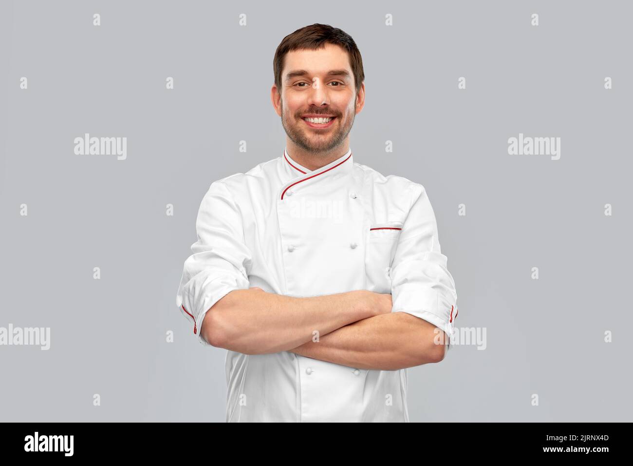 happy smiling male chef with crossed arms Stock Photo - Alamy