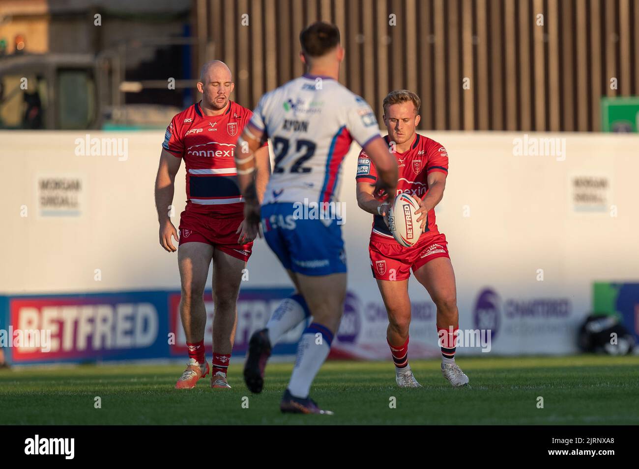 Jez Litten #14 of Hull KR puts in a kick forward Stock Photo - Alamy