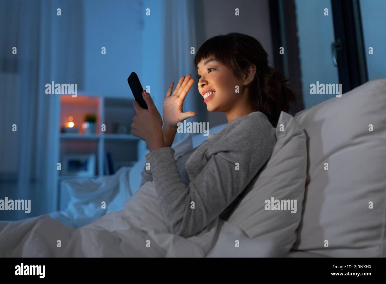 Night call in bed hi-res stock photography and images - Alamy