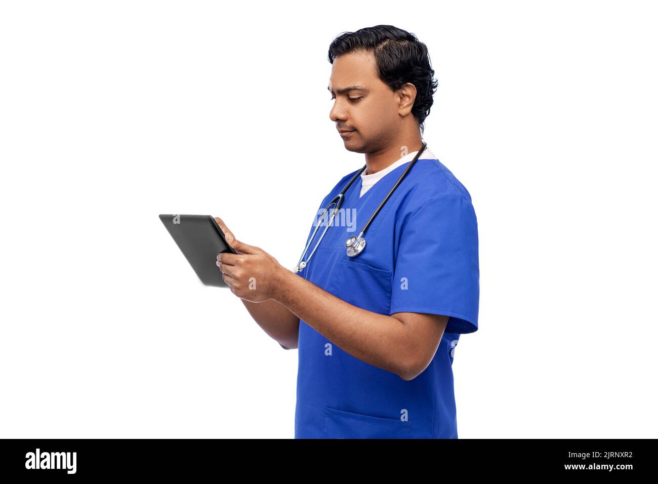 indian doctor or male nurse using tablet computer Stock Photo - Alamy