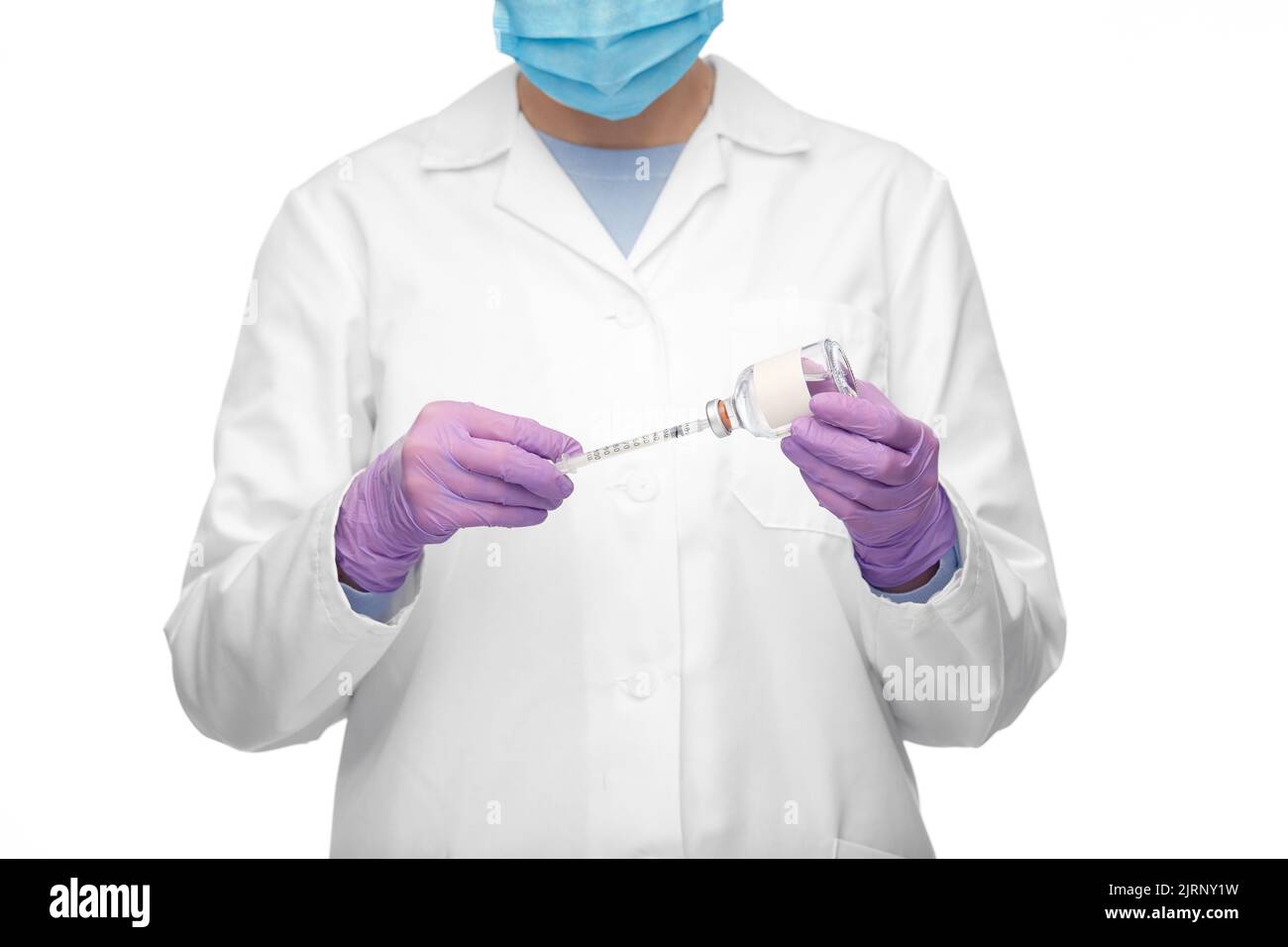 close up of doctor in mask with drug and syringe Stock Photo - Alamy