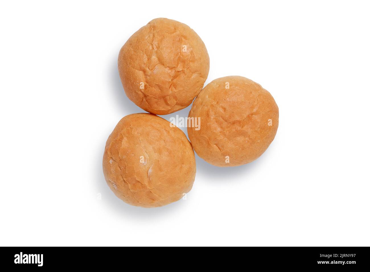 Three crusty bread rolls shot from above isolated on white with ...