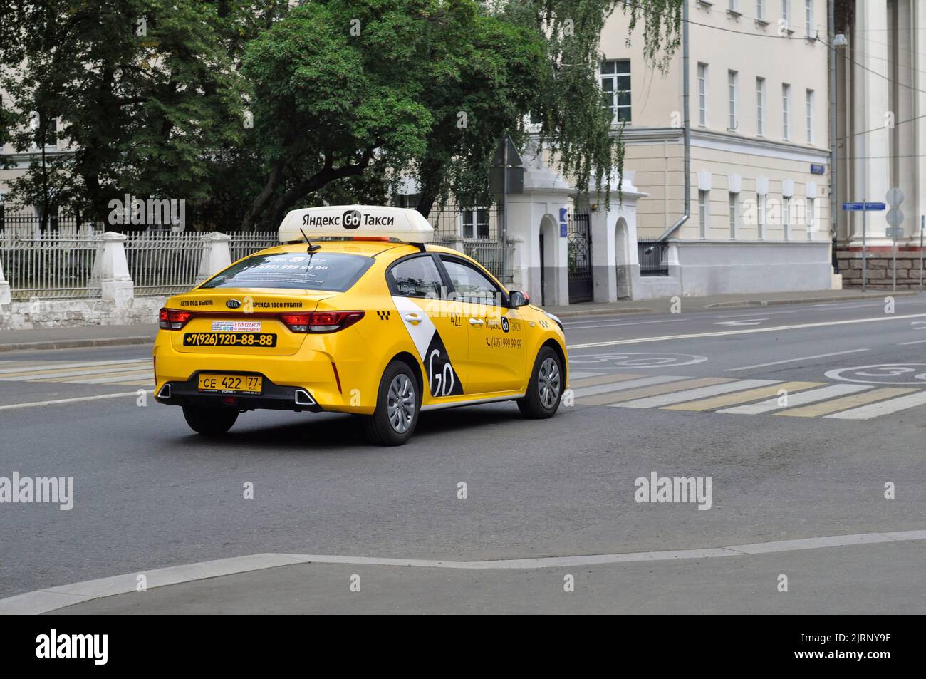 Moscow, Russia - August 21, 2022: yellow taxi on the street of Moscow ...