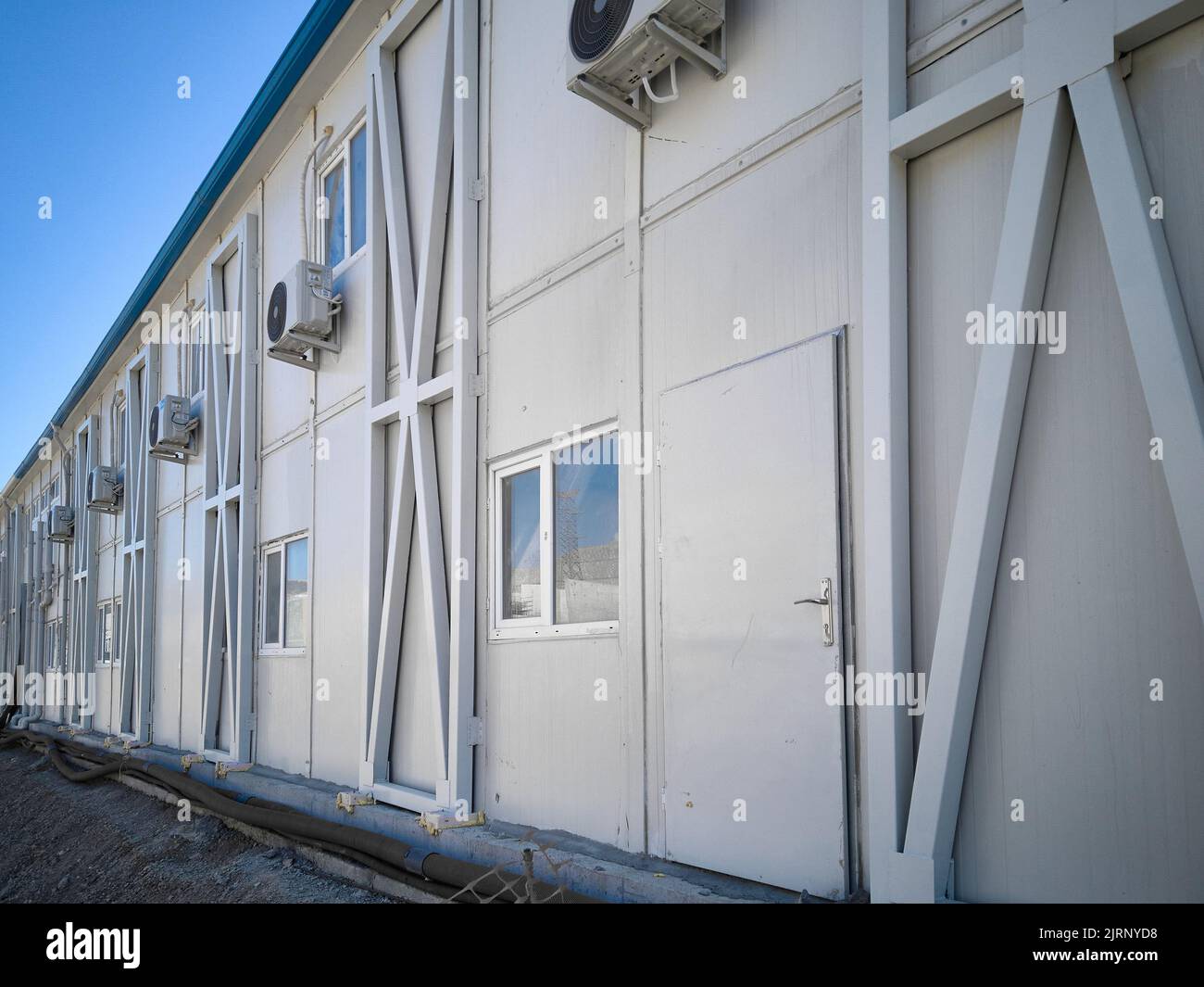 Prefabricated office container building at construction site Stock ...