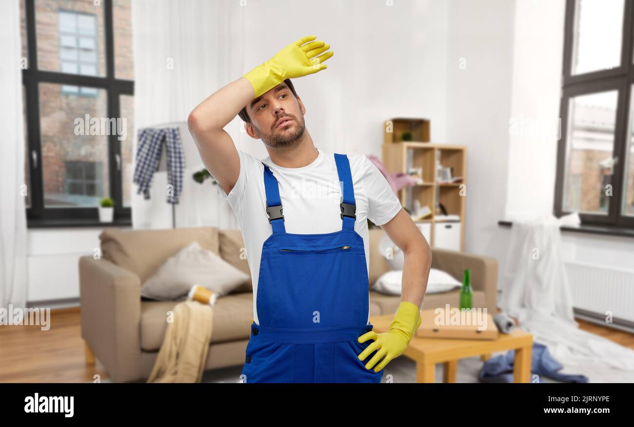 Male house cleaner in uniform hi-res stock photography and images - Alamy
