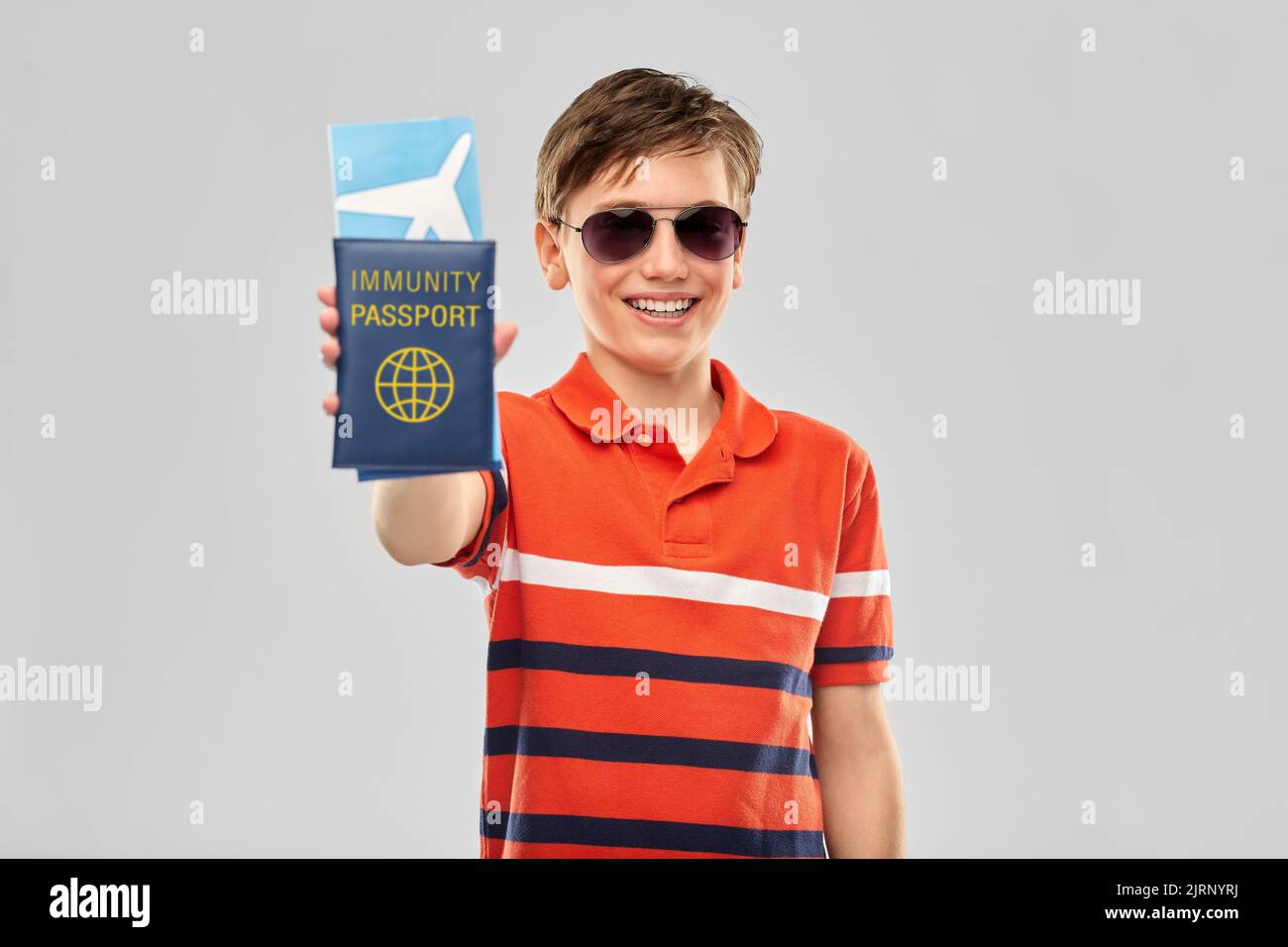 Boy with travel ticket hi-res stock photography and images - Alamy