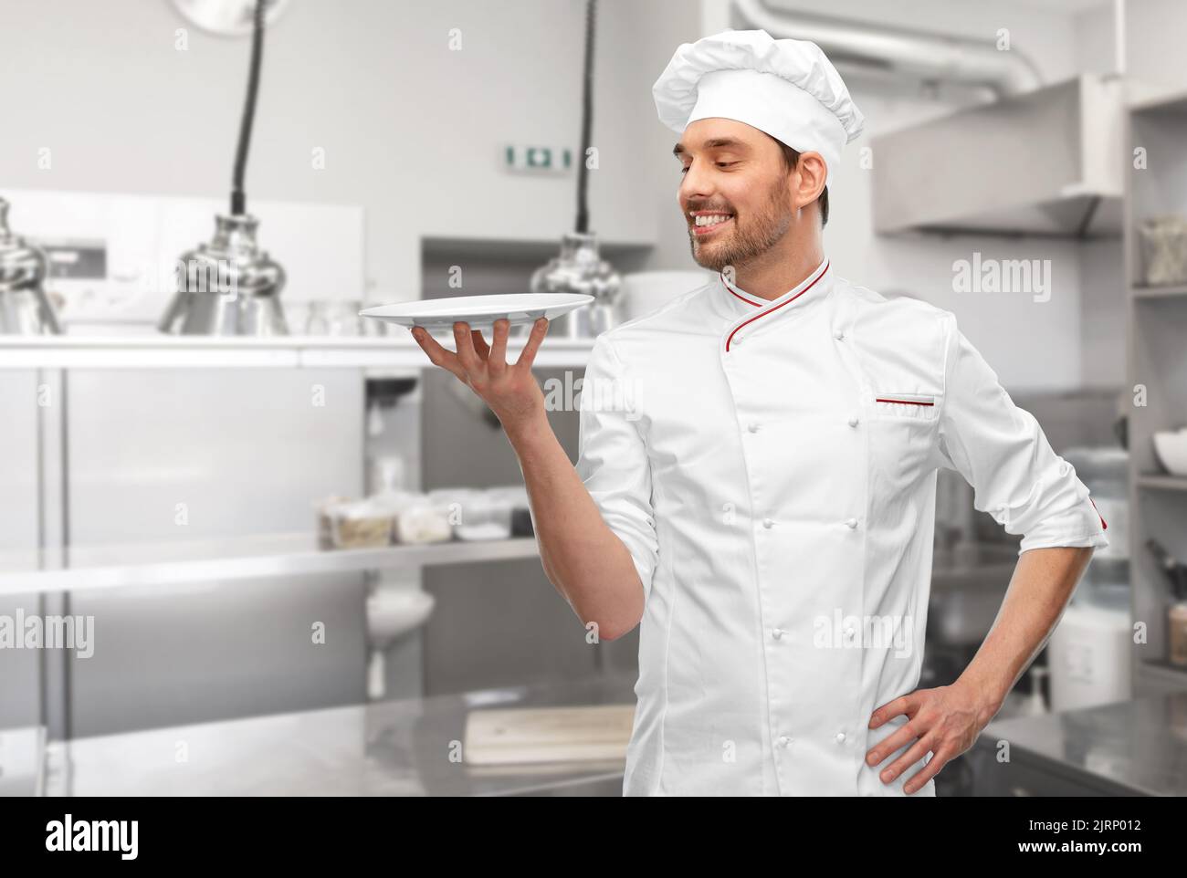 Male chef presenting food hi-res stock photography and images - Alamy