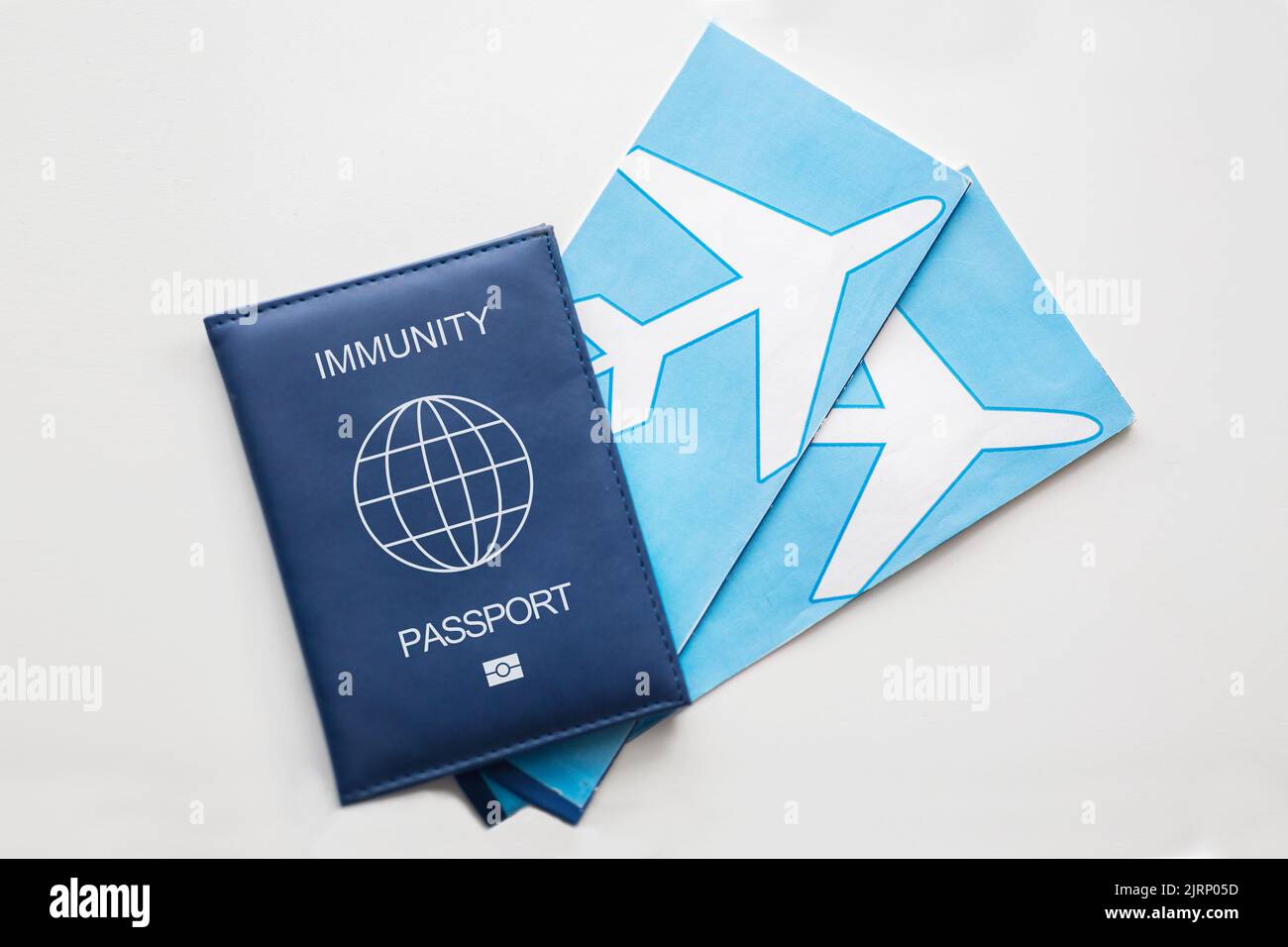 immunity passport and air tickets for travel Stock Photo - Alamy