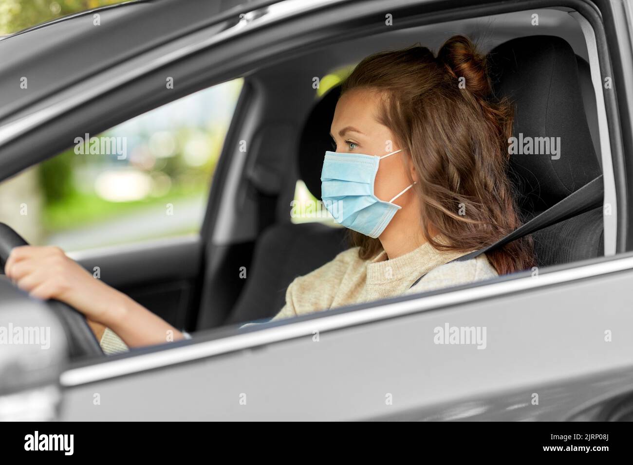 Woman driver mask car hi-res stock photography and images - Alamy