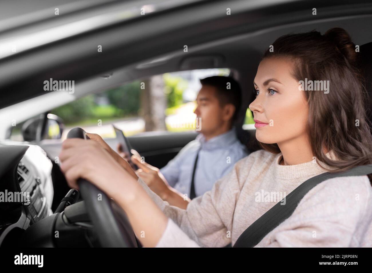 car driving school instructor teaching woman Stock Photo - Alamy