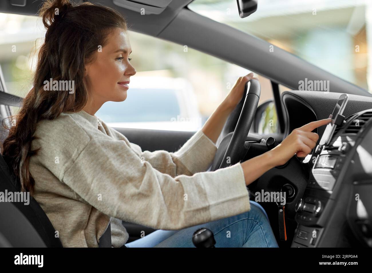 Car young driving distracting hi-res stock photography and images - Alamy