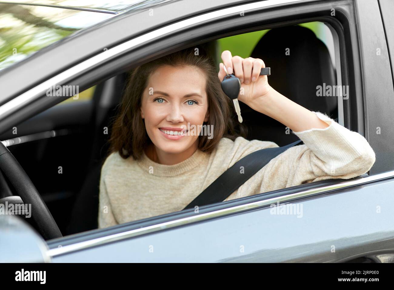 Female car owner hi-res stock photography and images - Alamy