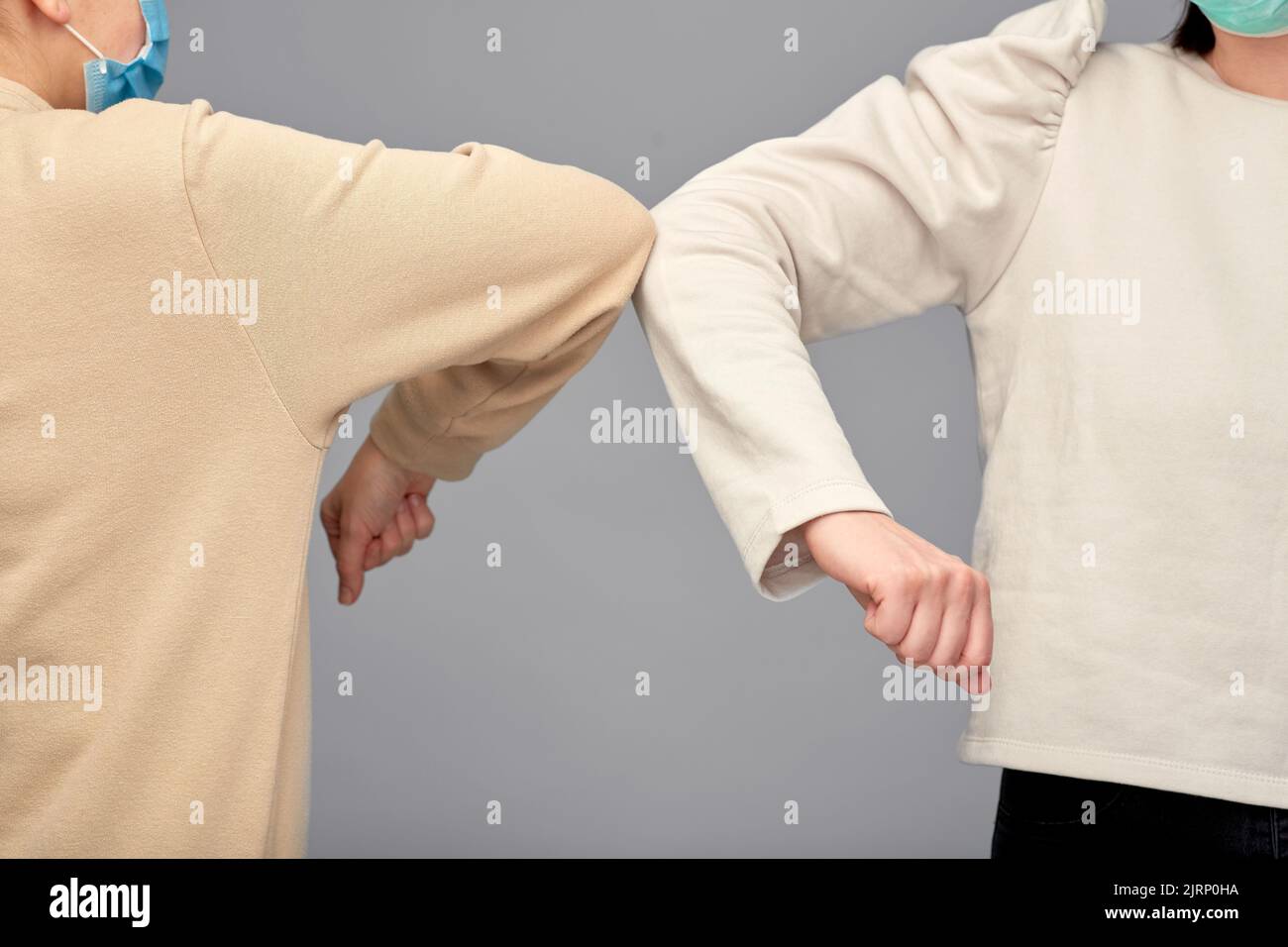 Closeup elbow bump hi-res stock photography and images - Alamy