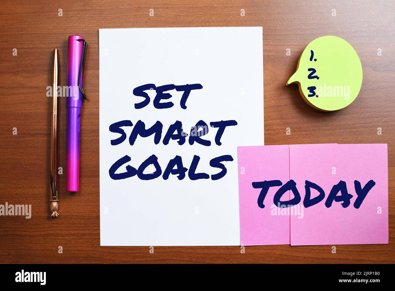 Hand writing sign Set Smart Goals. Business idea Establish achievable ...