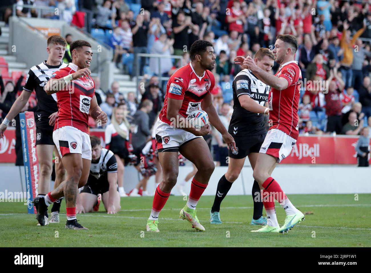 Salford reds Kallum Watkins after he scores his opening try during the ...