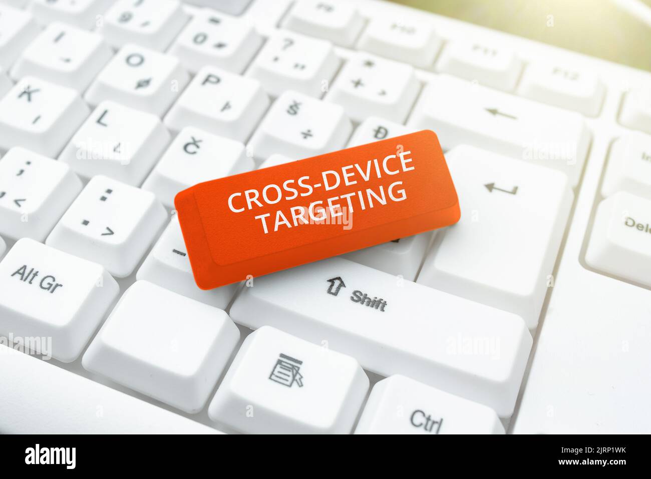 Hand writing sign Cross Device Targeting. Business concept identifying ...