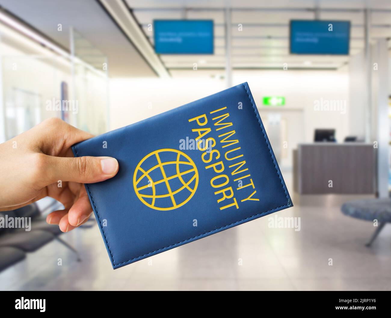 close up of hand holding immunity passport Stock Photo - Alamy