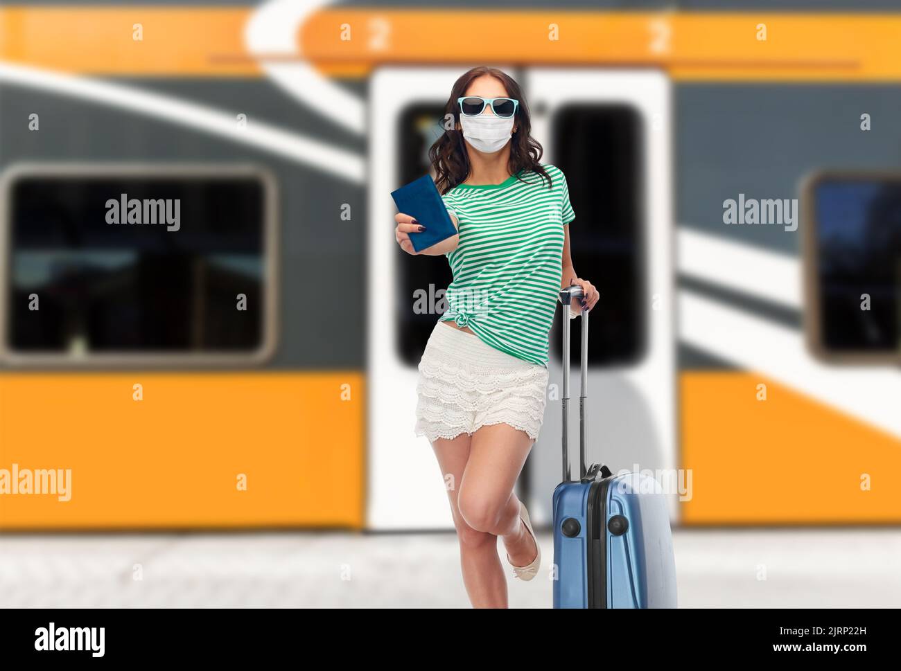 teenage girl in mask with travel bag and passport Stock Photo - Alamy