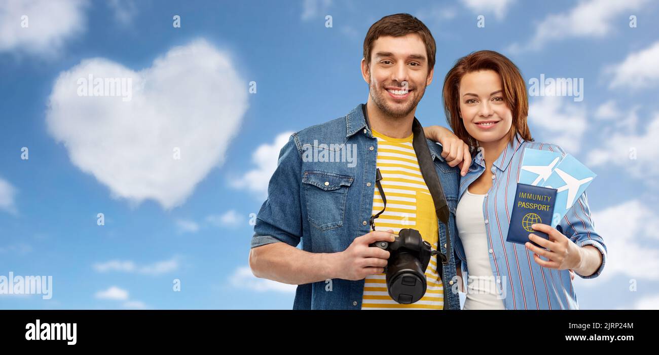 Couple with plane tickets hi-res stock photography and images - Alamy