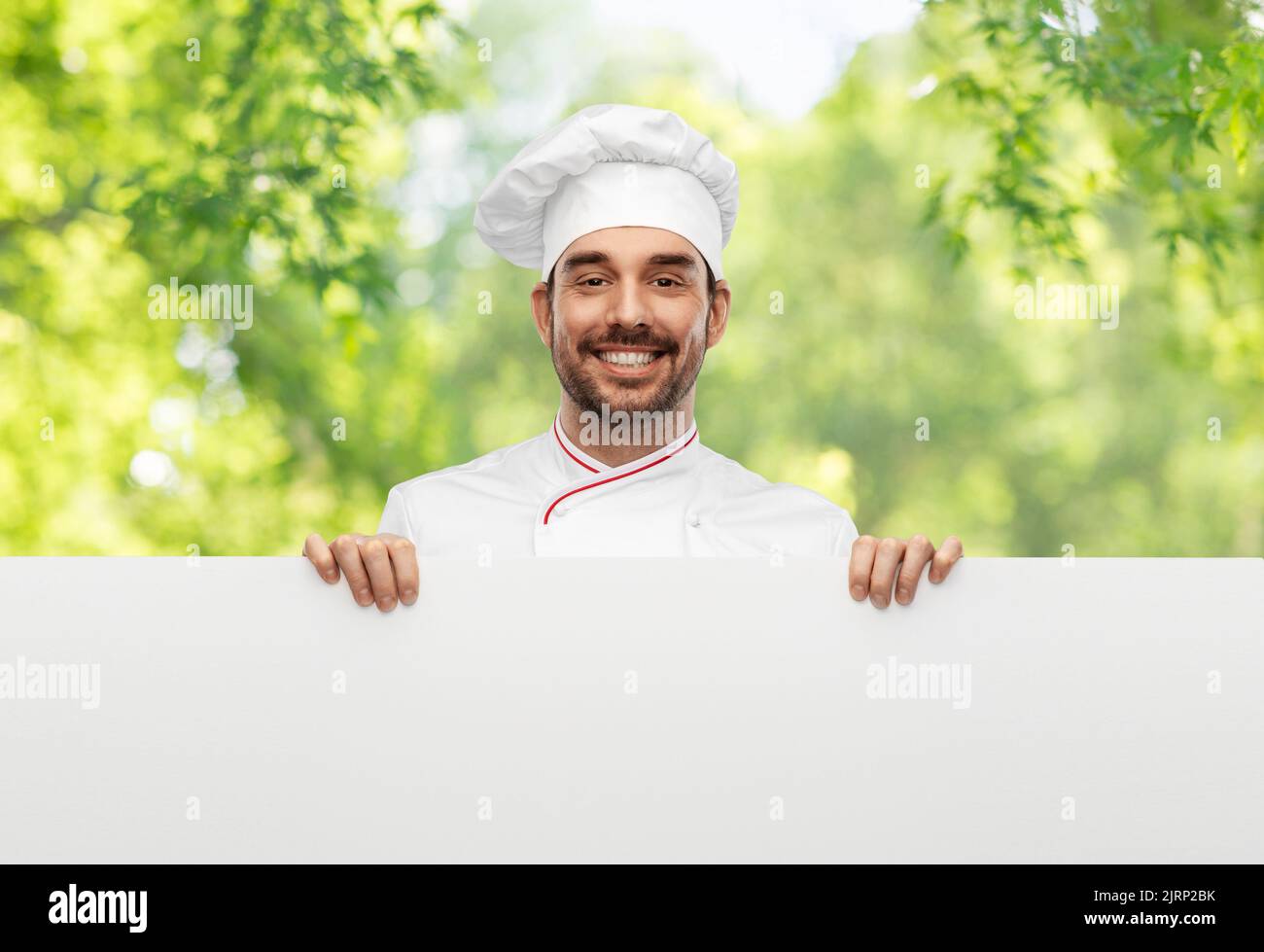 happy smiling male chef with big white board Stock Photo - Alamy