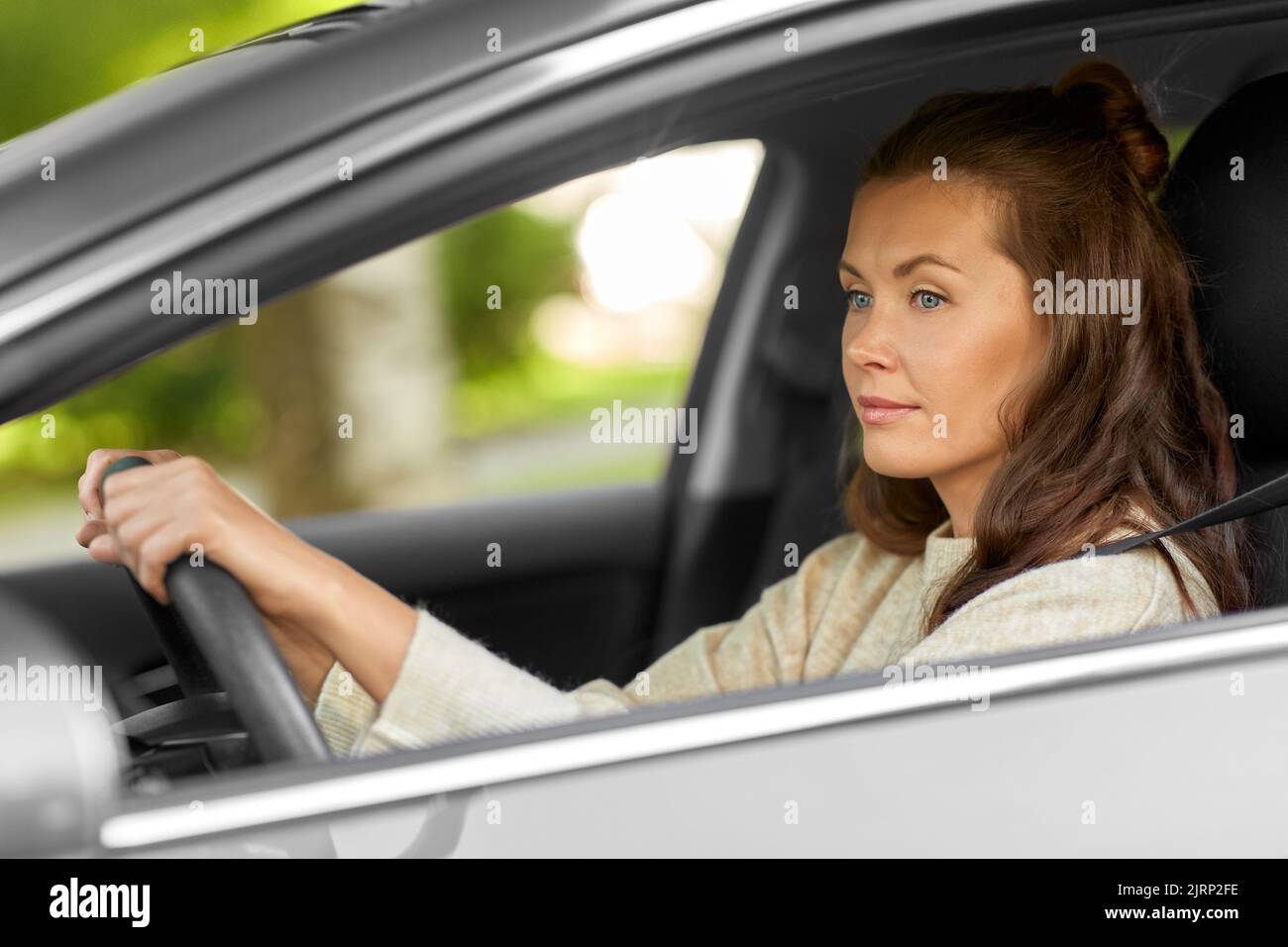 Beautiful female driver in hi-res stock photography and images - Alamy