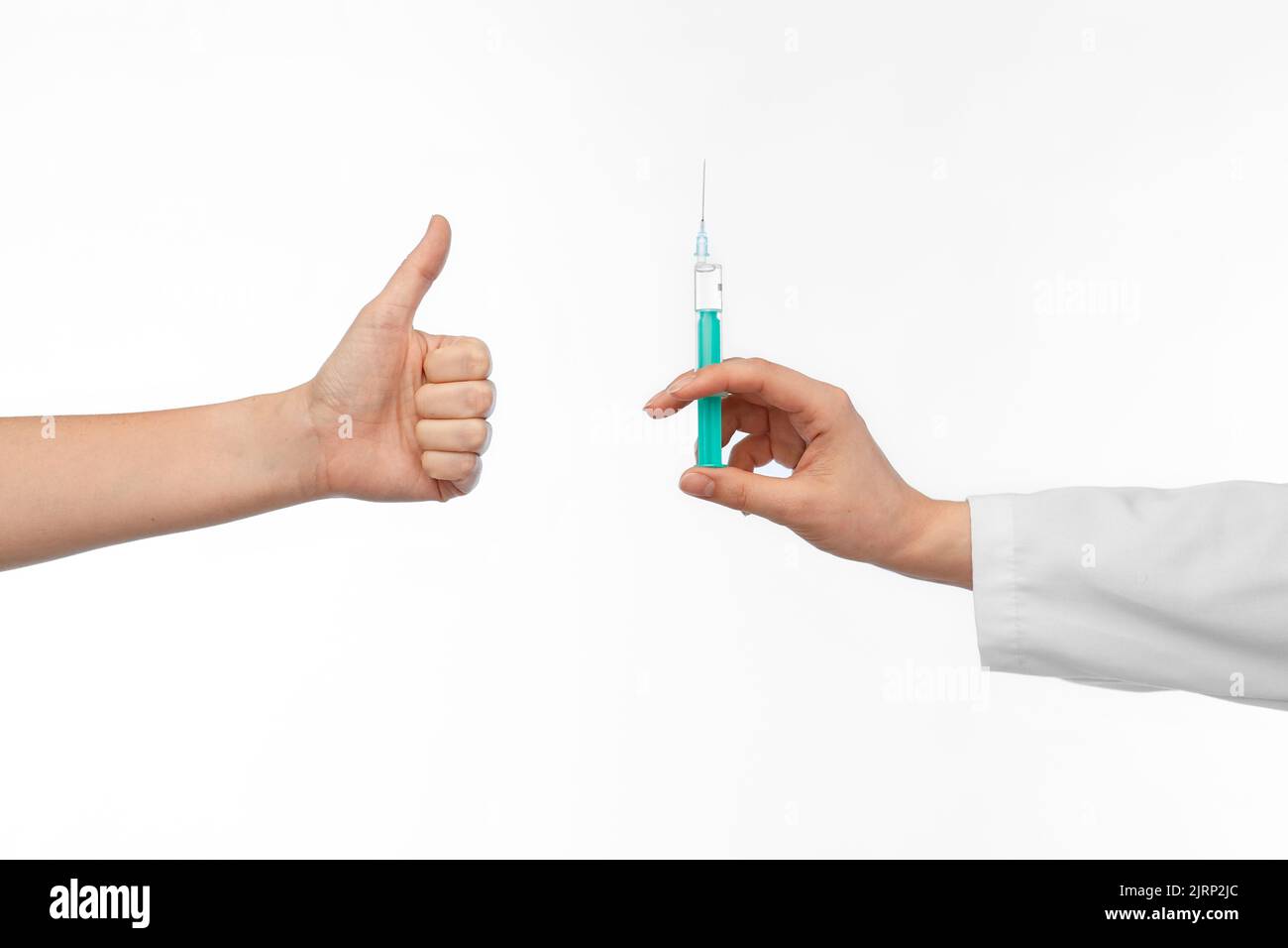 hand with medicine and showing thumbs up Stock Photo - Alamy