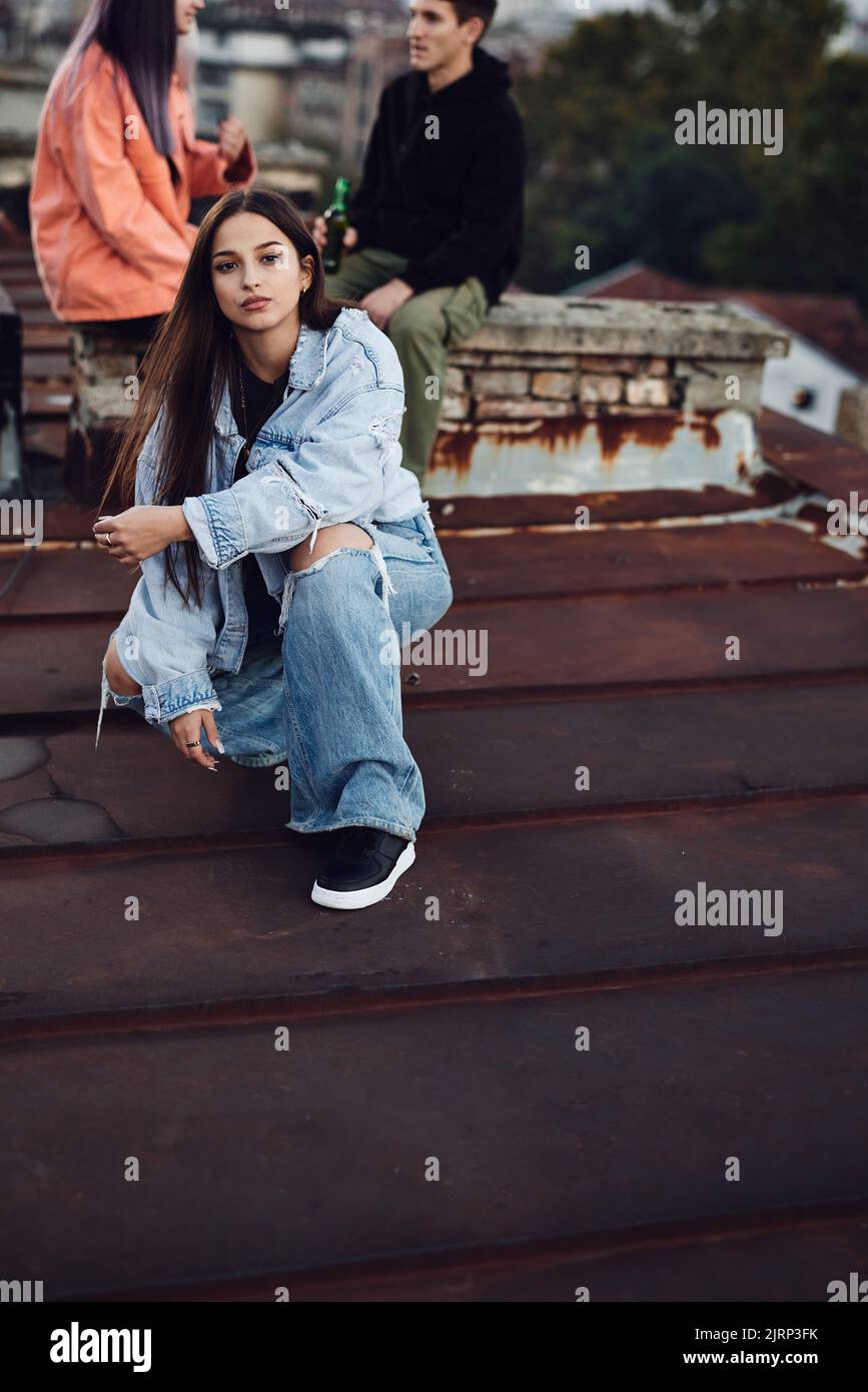 Rooftop girl hi-res stock photography and images - Alamy
