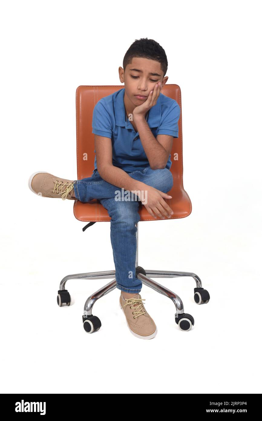 sad teen sitting on a chair on white background Stock Photo - Alamy